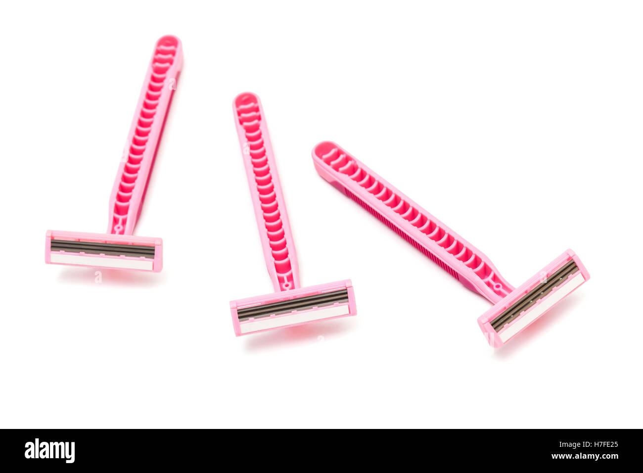 pink razor on a white background Stock Photo - Alamy