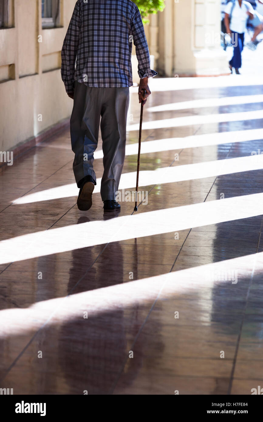 Old man with cane hi-res stock photography and images - Alamy