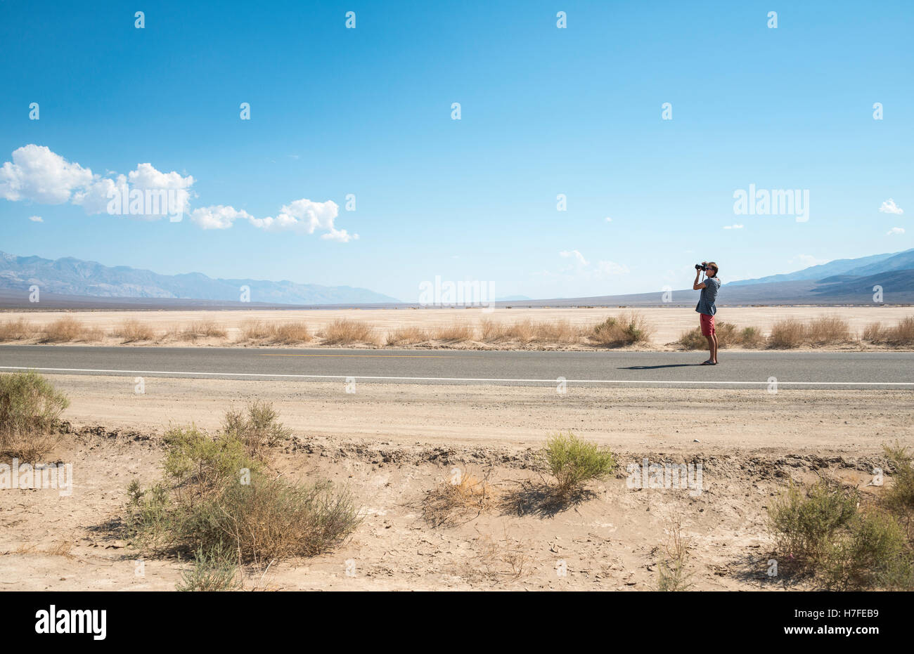 Man standing on the road hi-res stock photography and images - Alamy