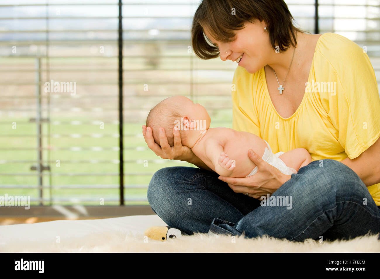 Mother with baby, 1 month Stock Photo - Alamy