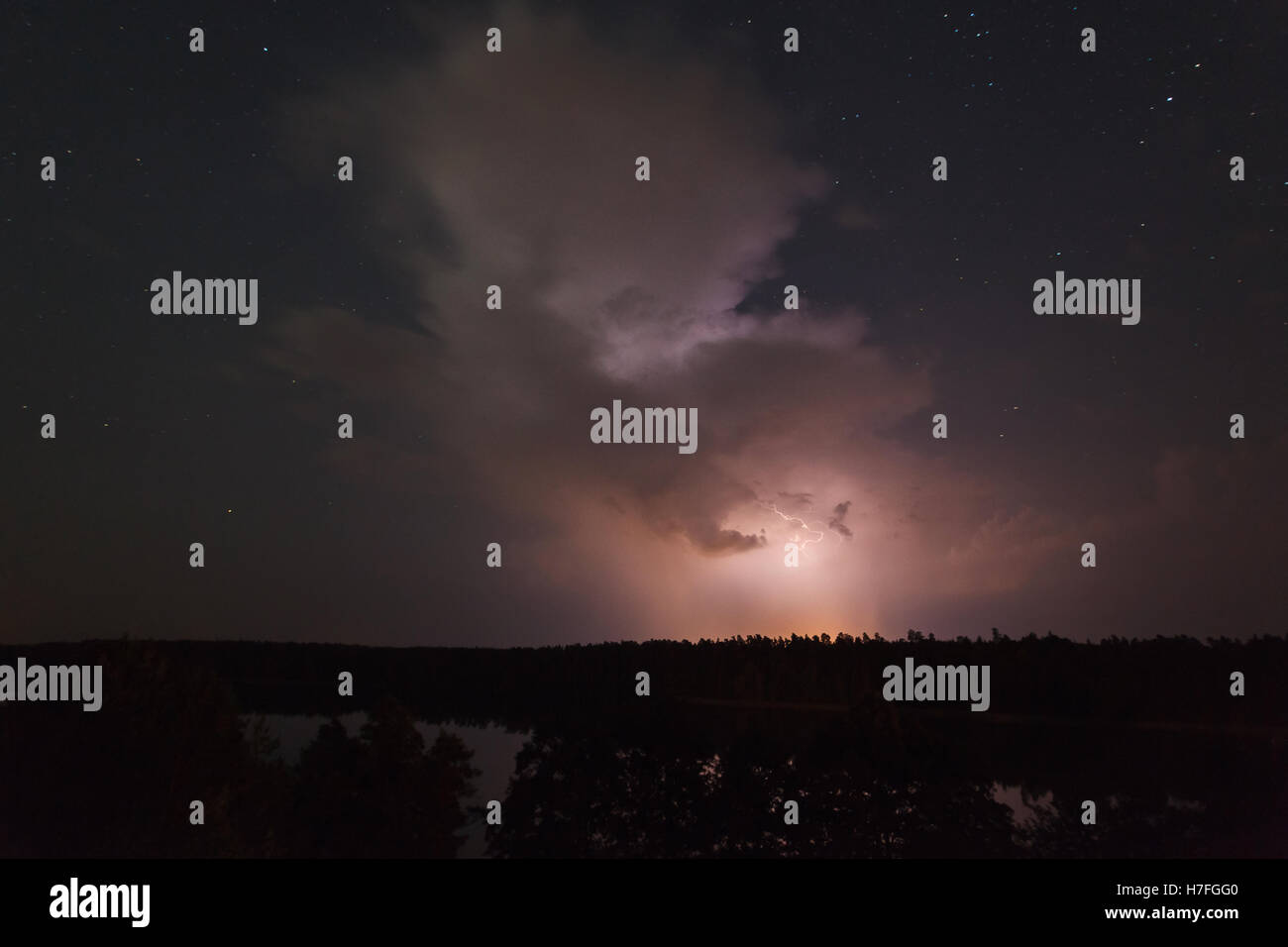 Storm at night, starry sky Stock Photo - Alamy