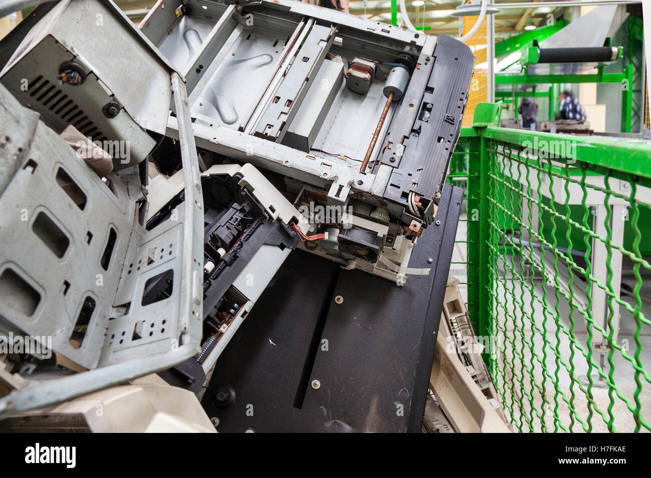 A pile of old junk parts from computers ready to be recycled in a ...