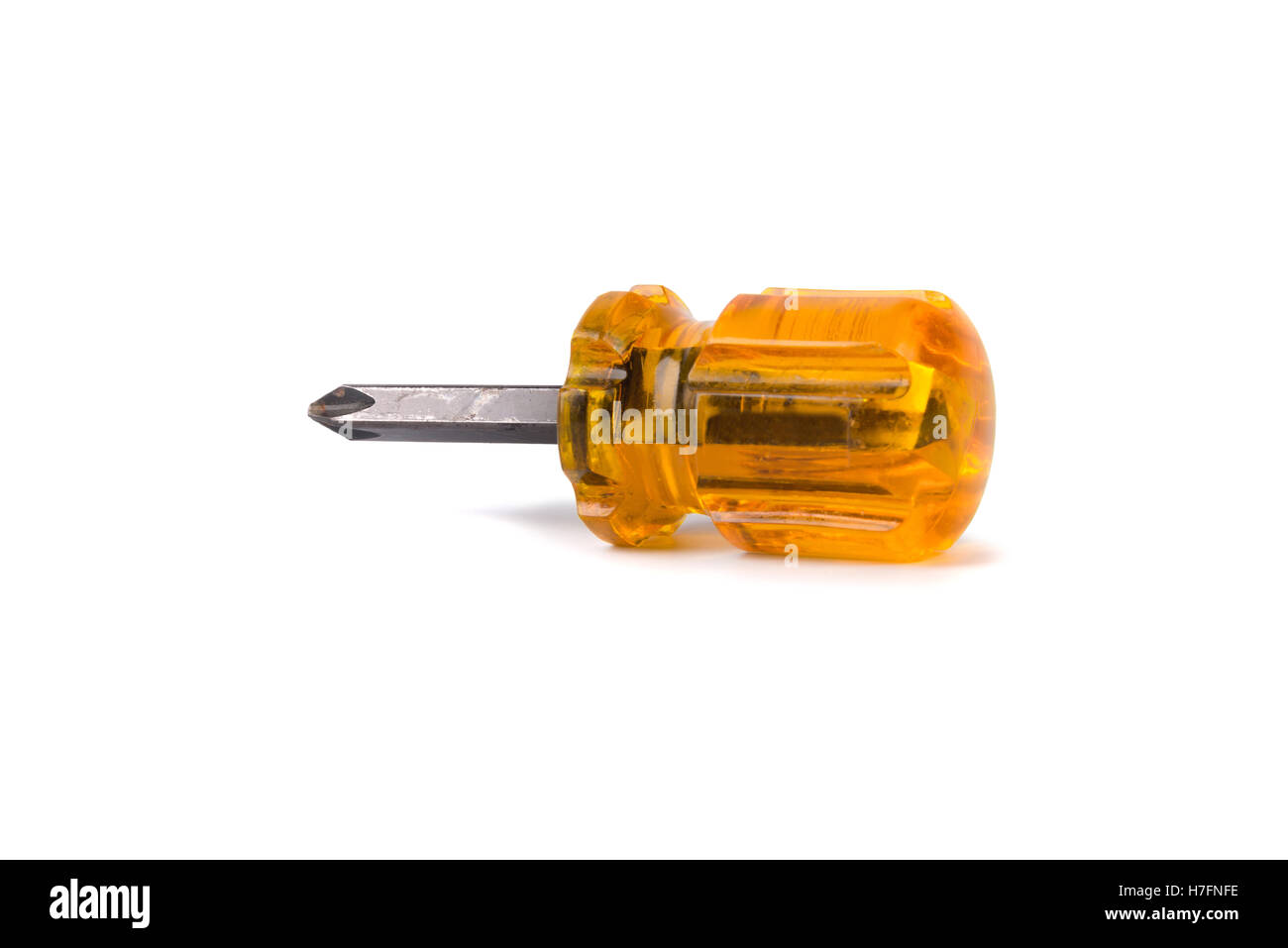 Orange short screwdriver isolated with soft shadow on white background ...