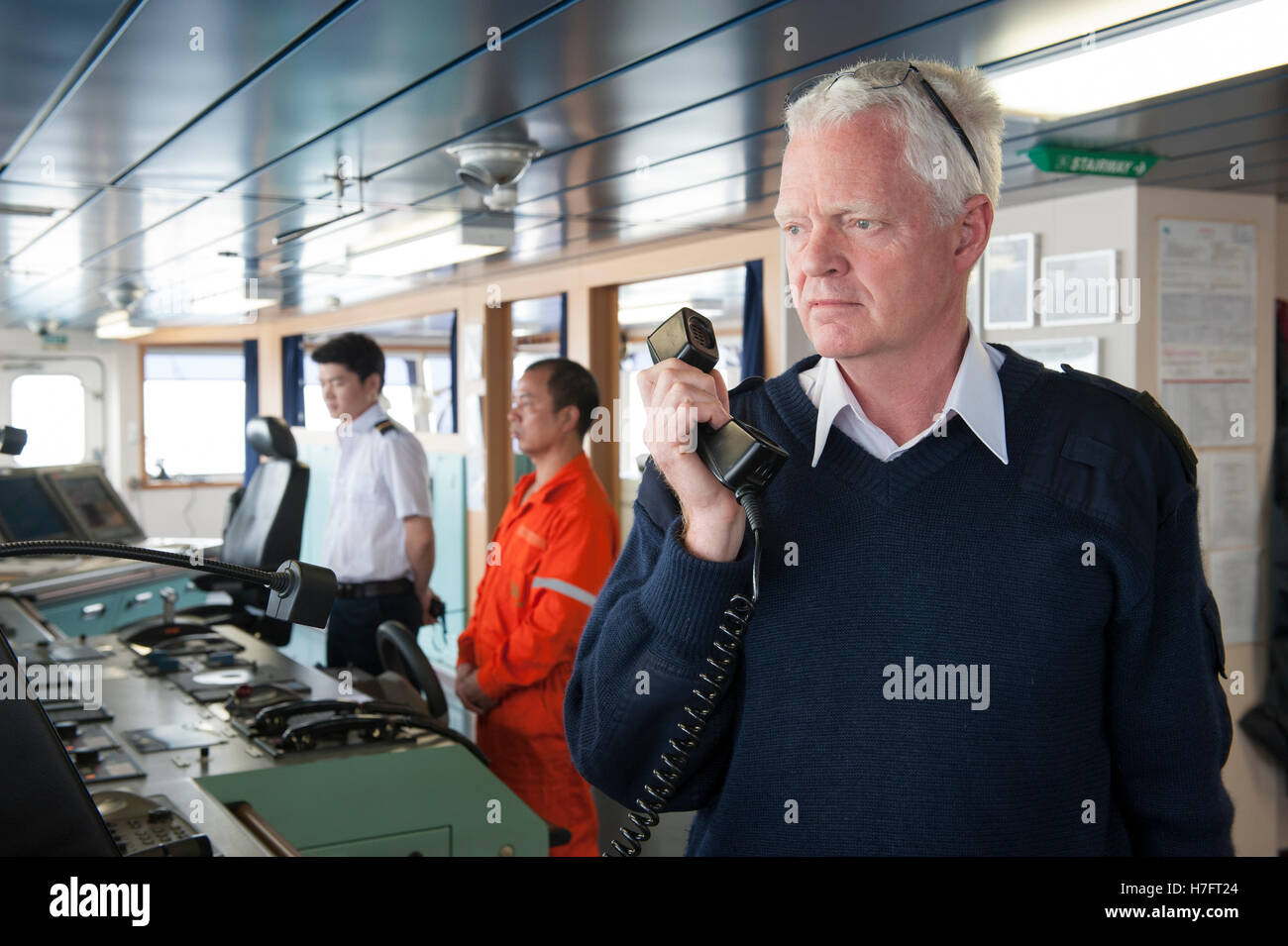 Harbor pilot and captain on bridge hi-res stock photography and images ...