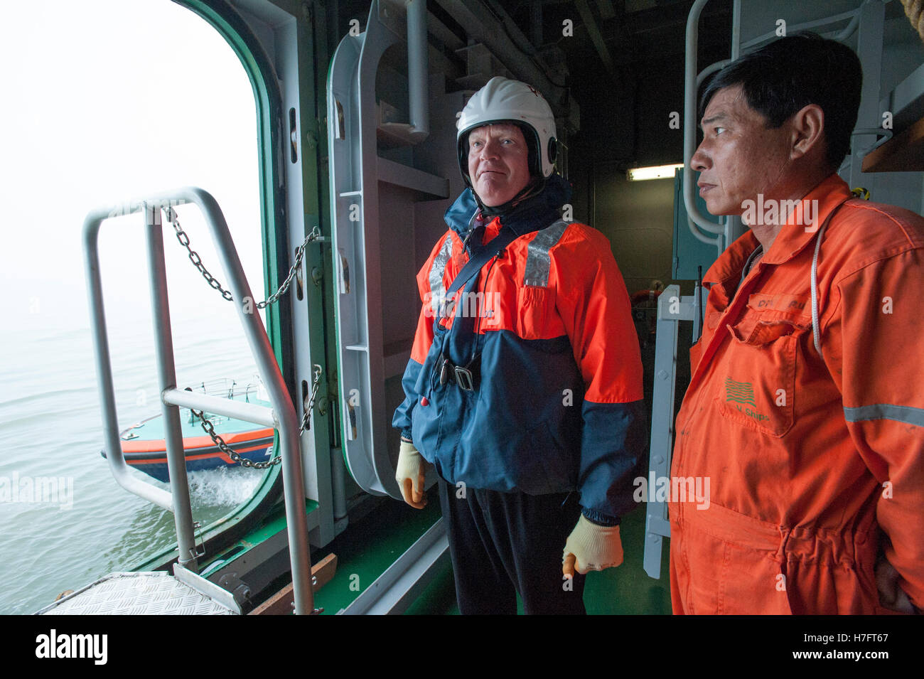 Harbour pilot on board a container ship Stock Photo - Alamy