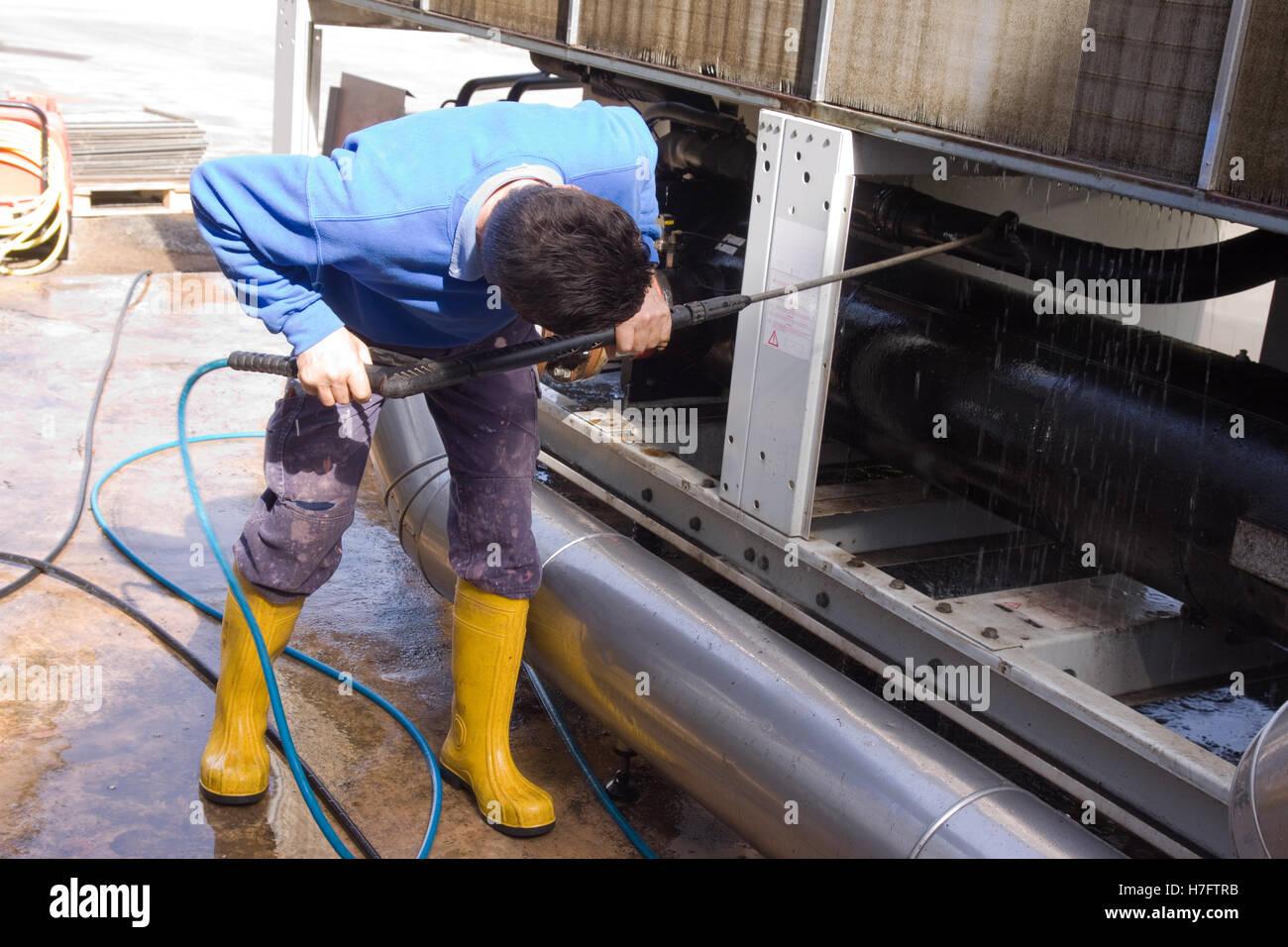 washing dirty premises on a industry place Stock Photo - Alamy