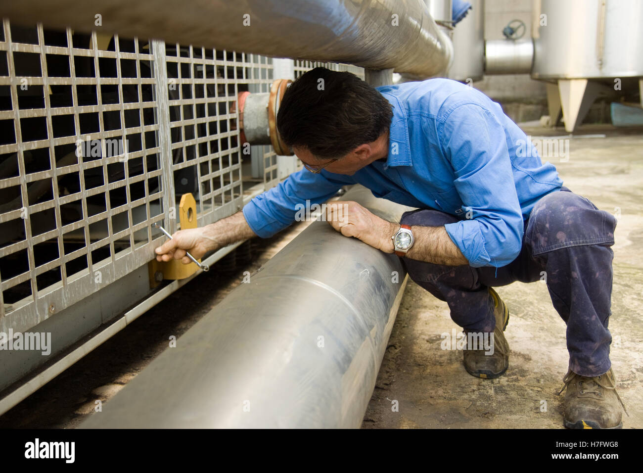 repairing a broken machinery Stock Photo - Alamy