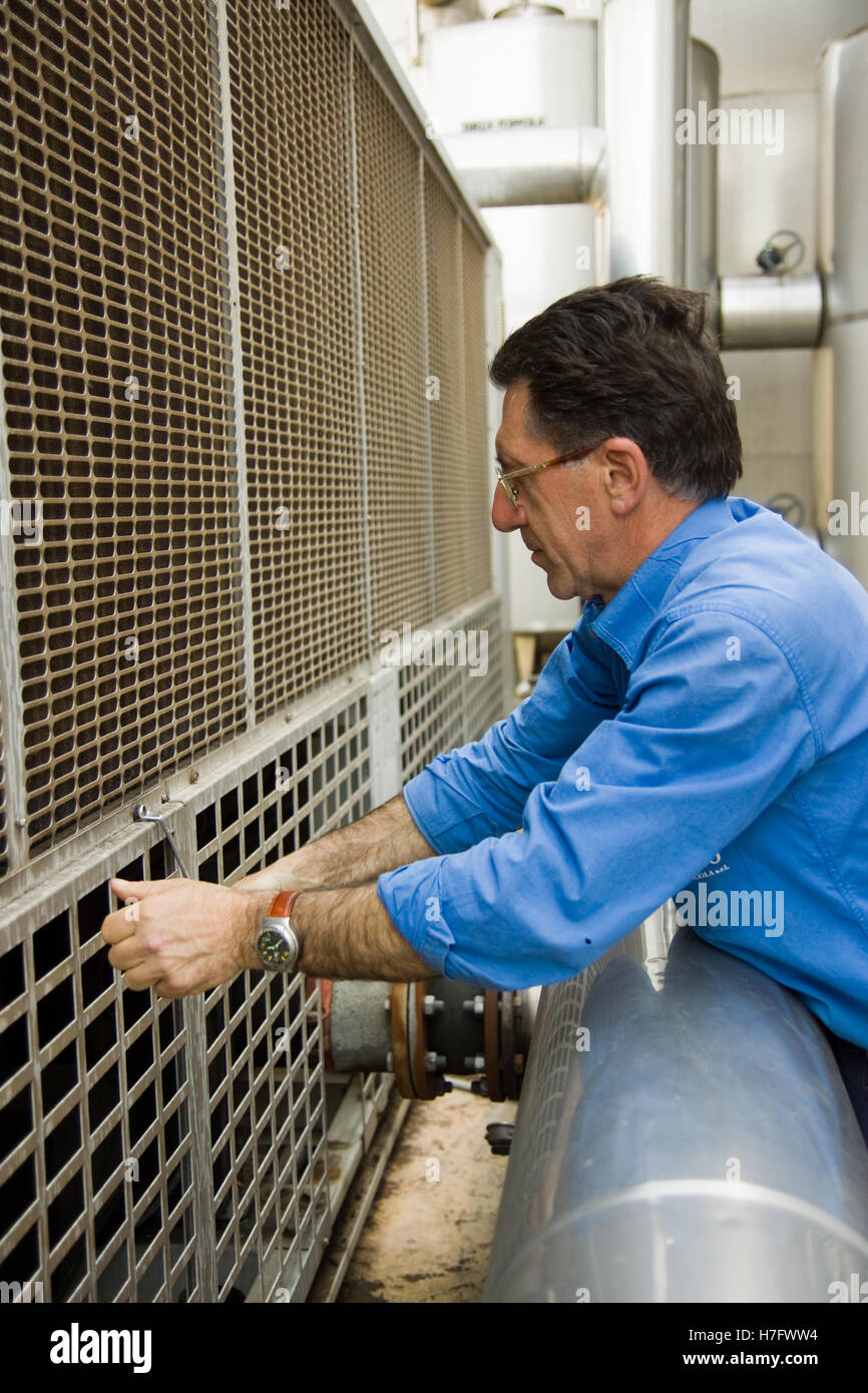 repairing a broken machinery Stock Photo - Alamy