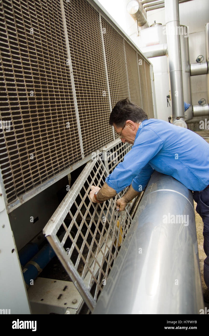 repairing a broken machinery Stock Photo - Alamy