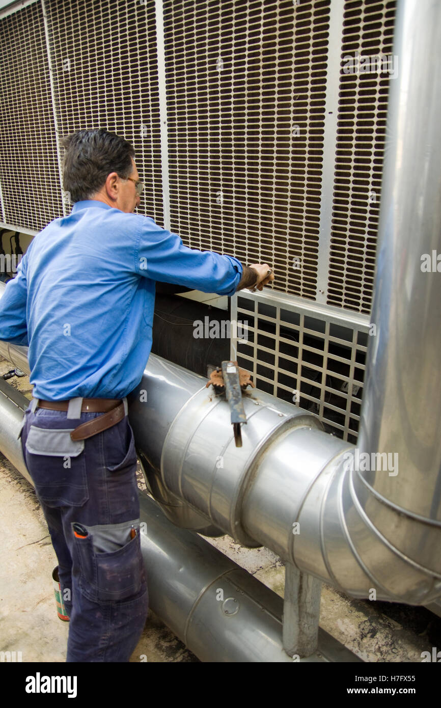 repairing a broken machinery Stock Photo - Alamy