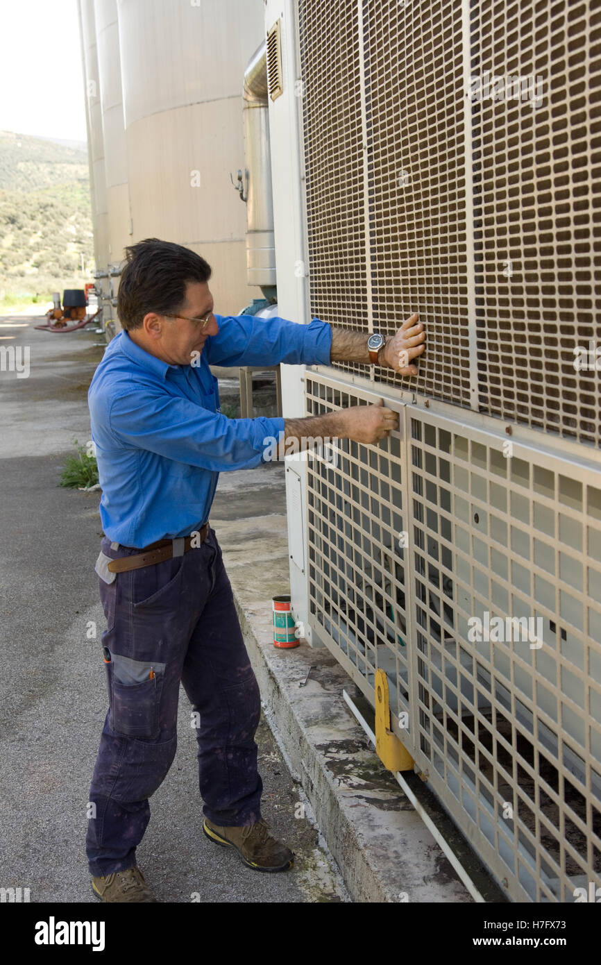 repairing a broken machinery Stock Photo - Alamy