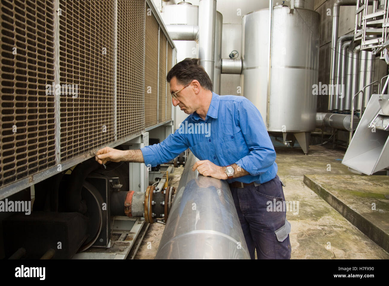 repairing a broken machinery Stock Photo - Alamy