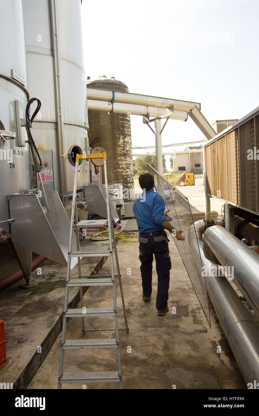 repairing a broken machinery Stock Photo - Alamy