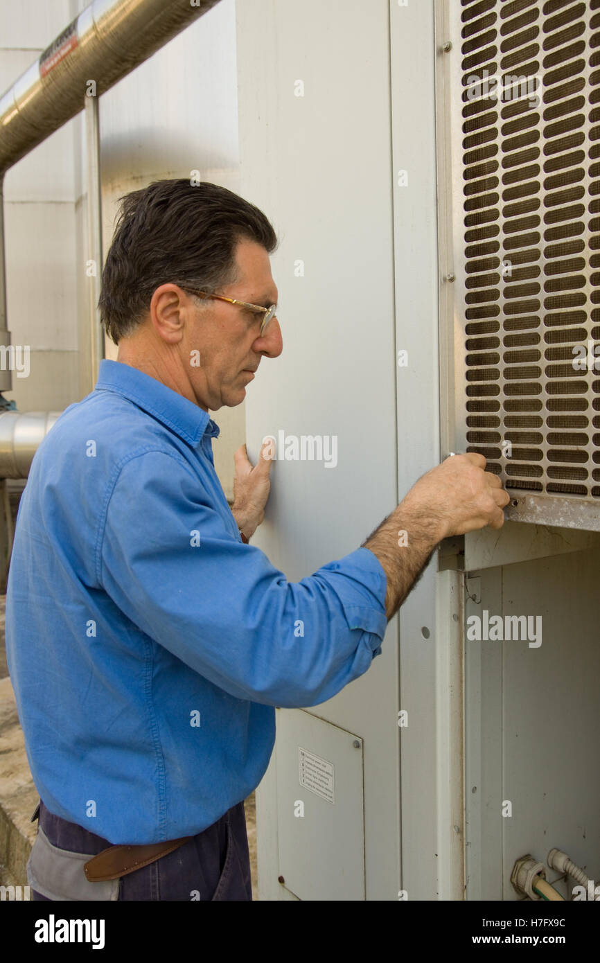 repairing a broken machinery Stock Photo - Alamy