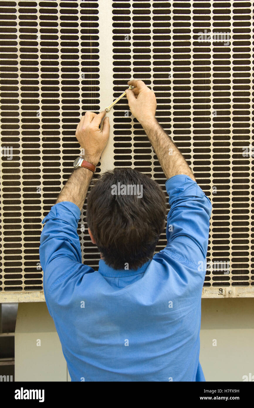 repairing a broken machinery Stock Photo - Alamy