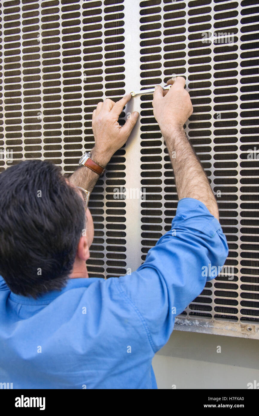 repairing a broken machinery Stock Photo - Alamy