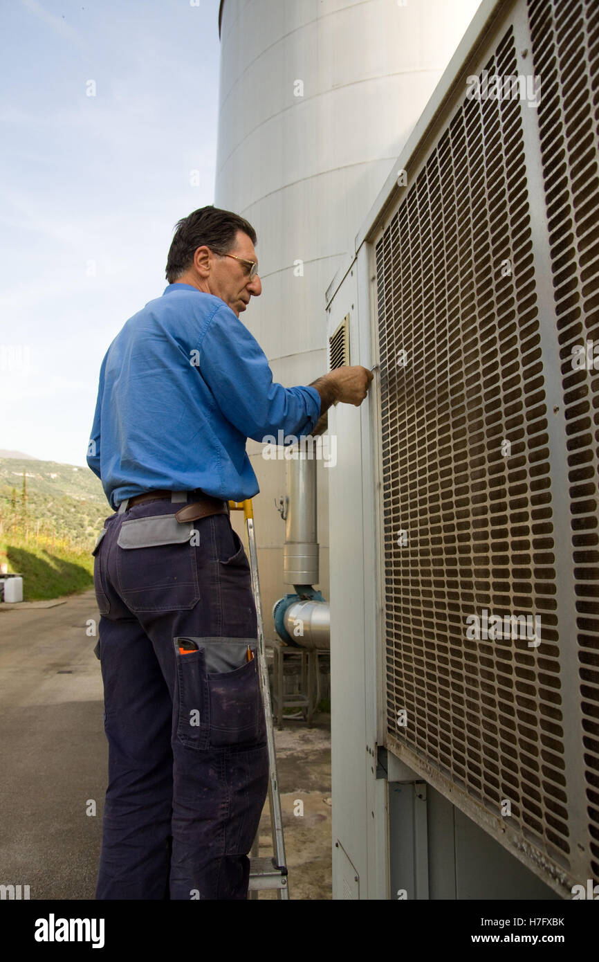 repairing a broken machinery Stock Photo - Alamy