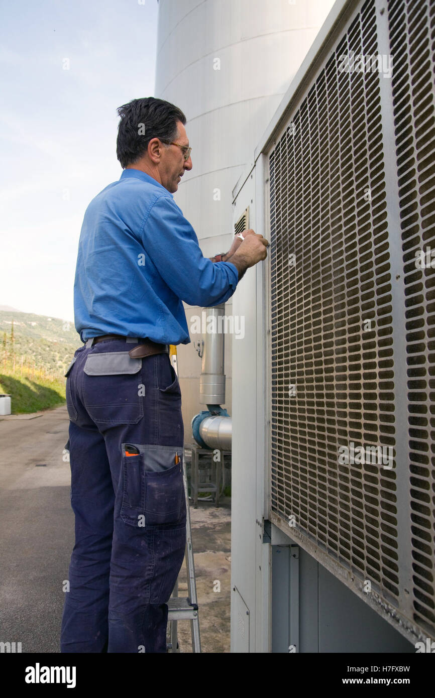 repairing a broken machinery Stock Photo - Alamy