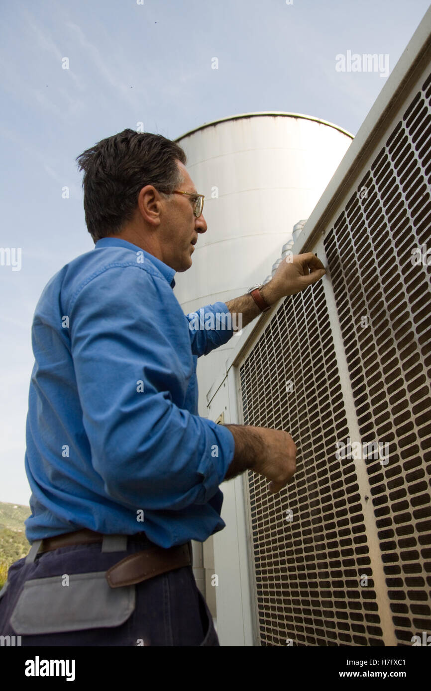 repairing a broken machinery Stock Photo - Alamy