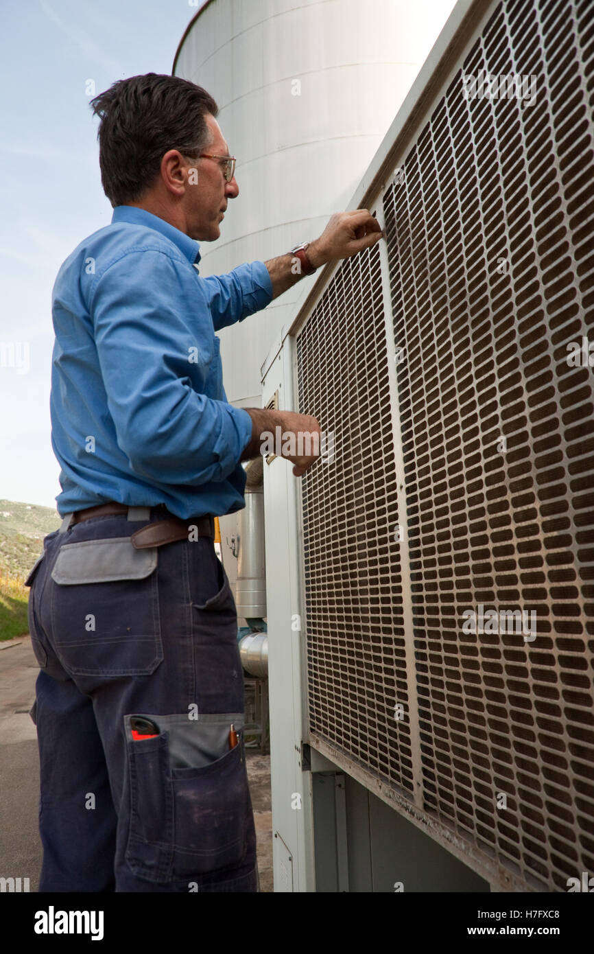 repairing a broken machinery Stock Photo - Alamy
