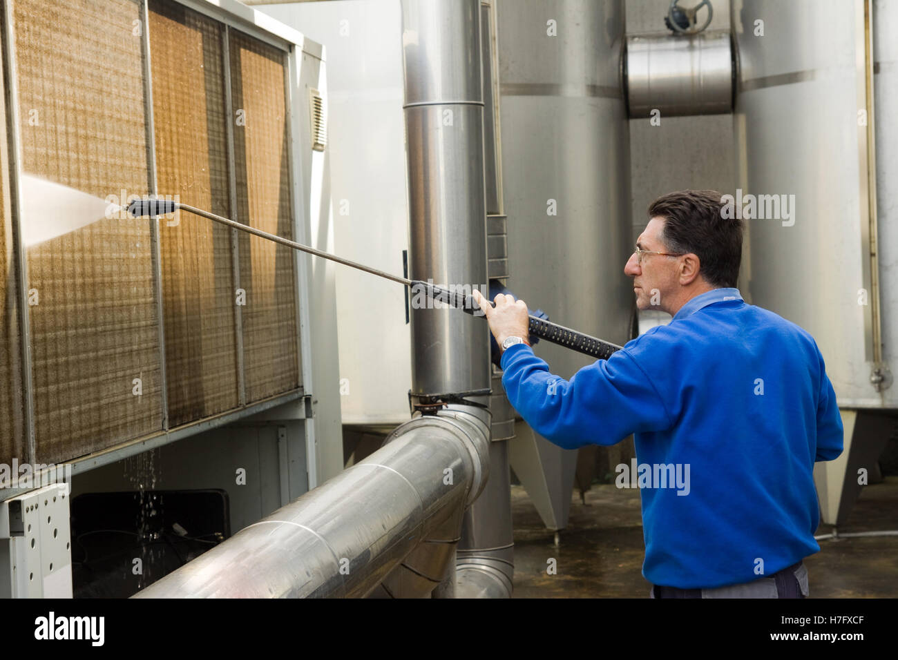 washing dirty premises on a industry place Stock Photo - Alamy