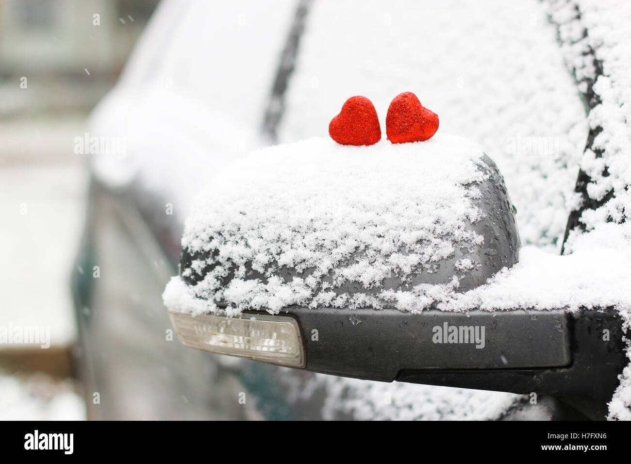 Snow hearts red winter two Stock Photo - Alamy
