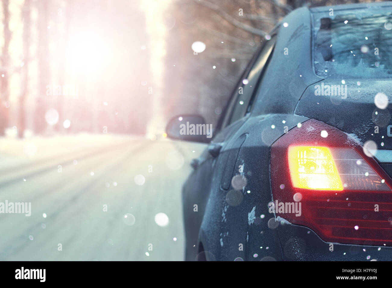 car on road trees winter sunset Stock Photo - Alamy