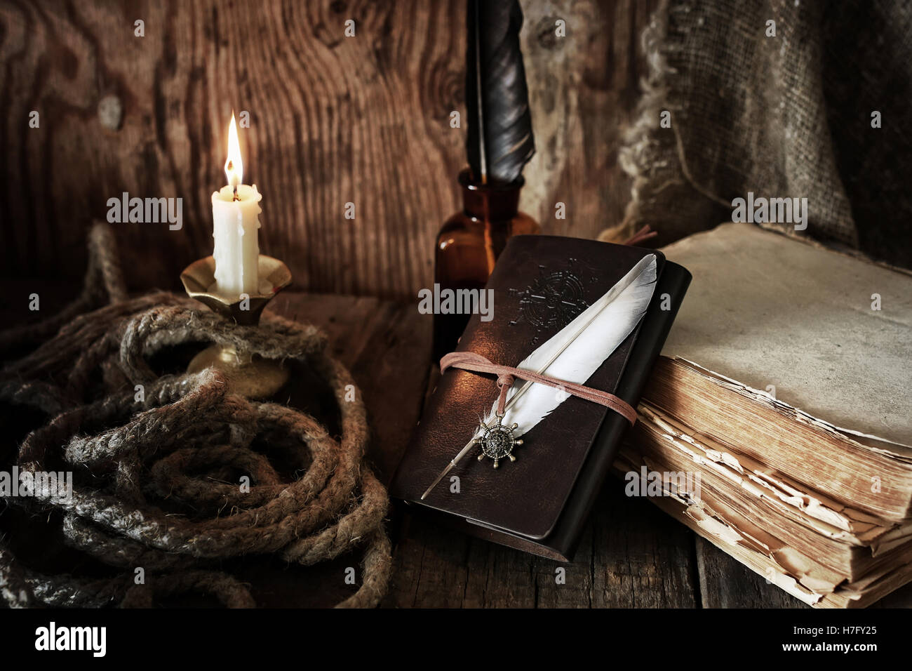 pirate object on wooden table Stock Photo - Alamy