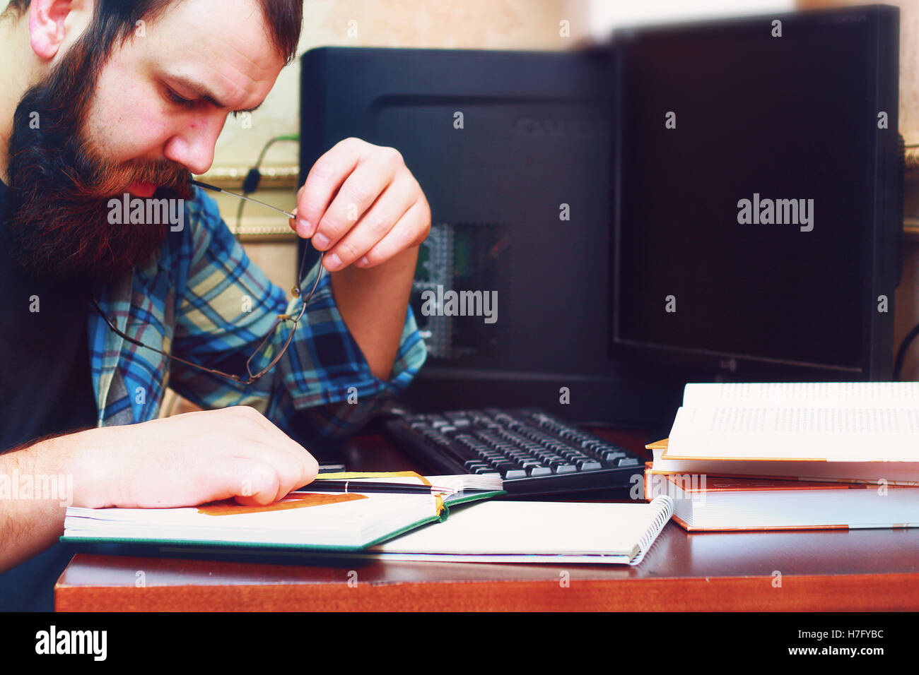 male work computer pen write Stock Photo - Alamy
