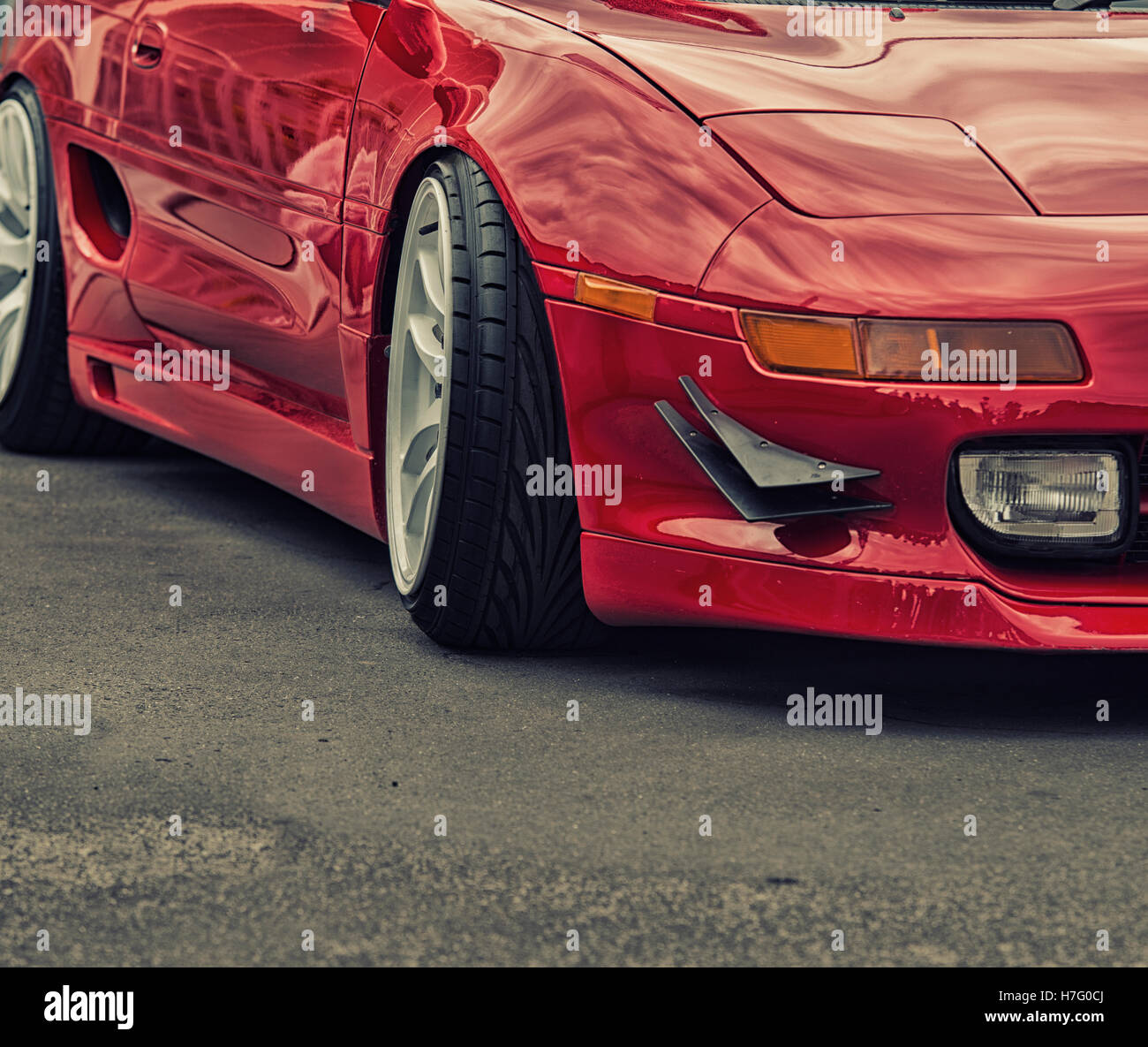 sport red car on the street Stock Photo - Alamy
