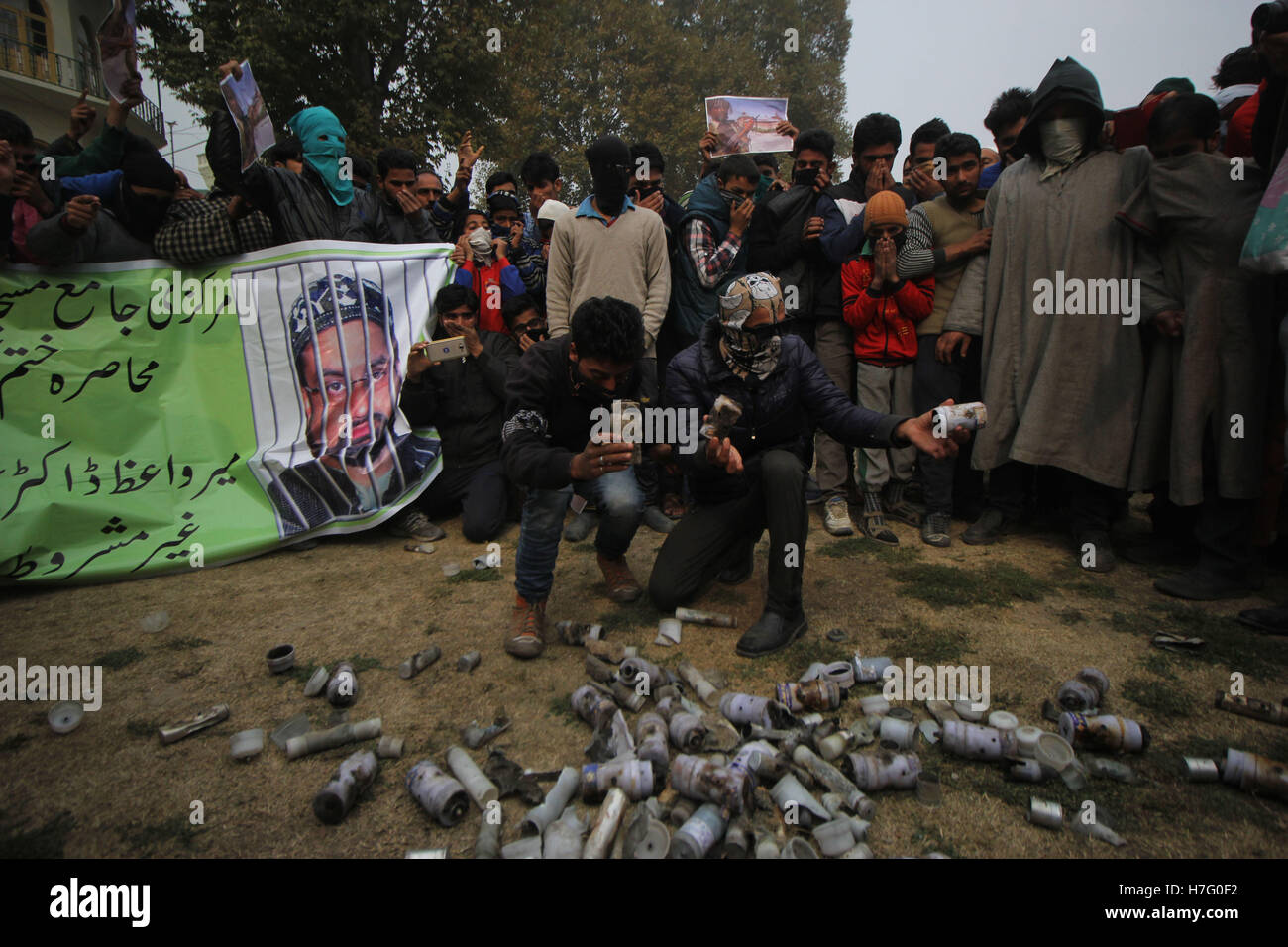 Srinagar, India. 04th Nov, 2016. Youth showing exploded tear smoke ...