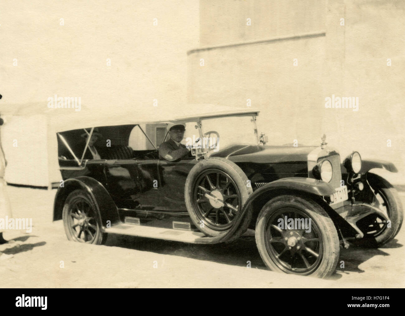 Big old car with the driver, Italy Stock Photo - Alamy