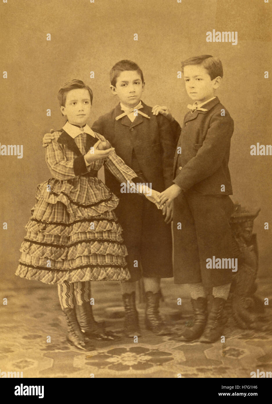 Portrait of three children, Italy Stock Photo - Alamy