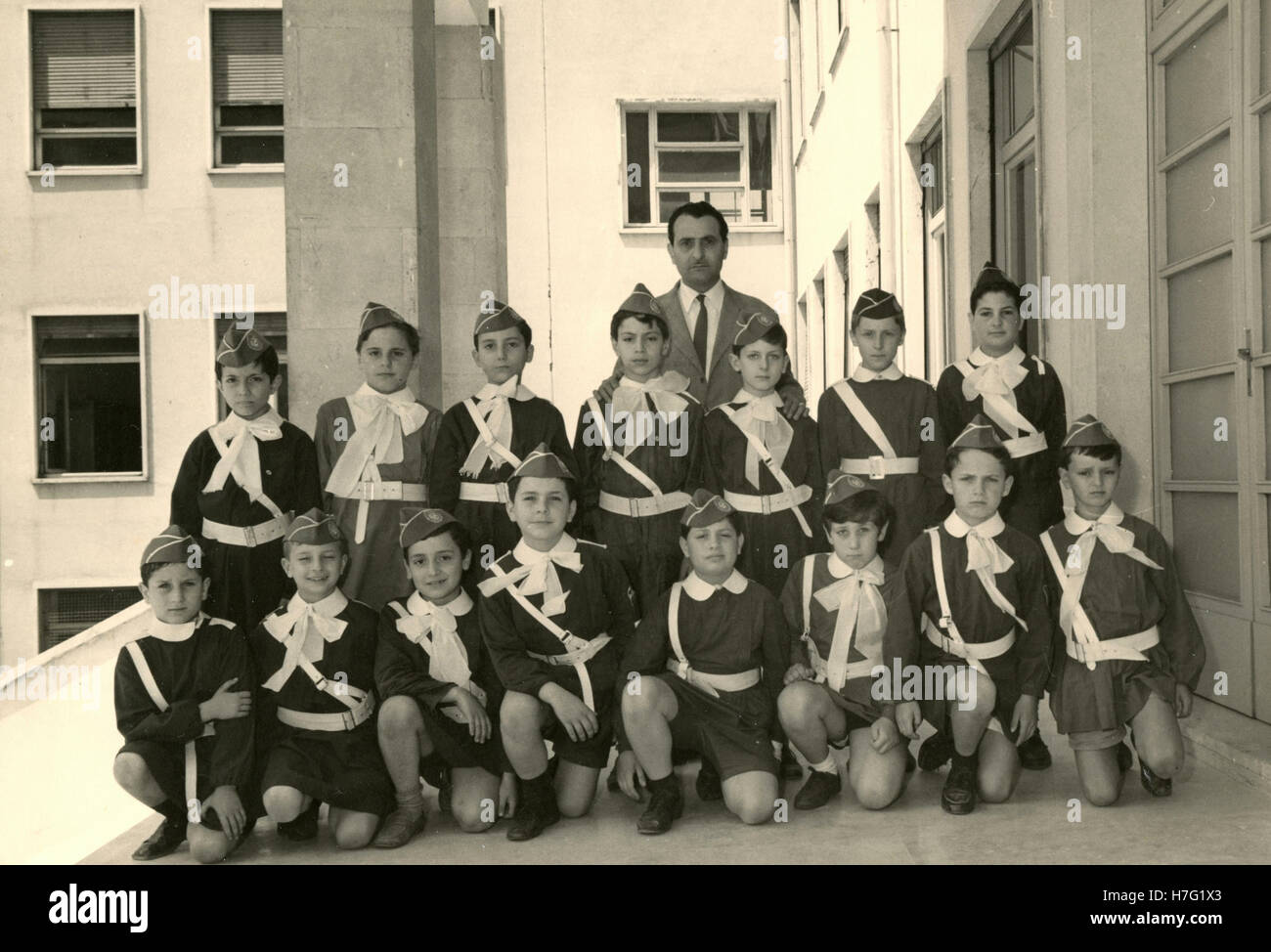 Female school photo with the apron and hat, Italy Stock Photo - Alamy
