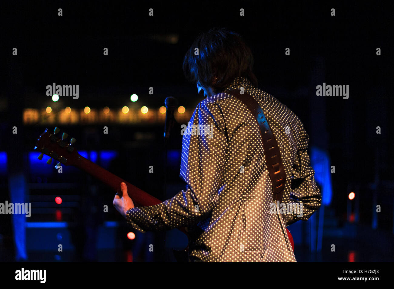 young rock singer on stage playing guitar,Music, artist, concert Stock ...