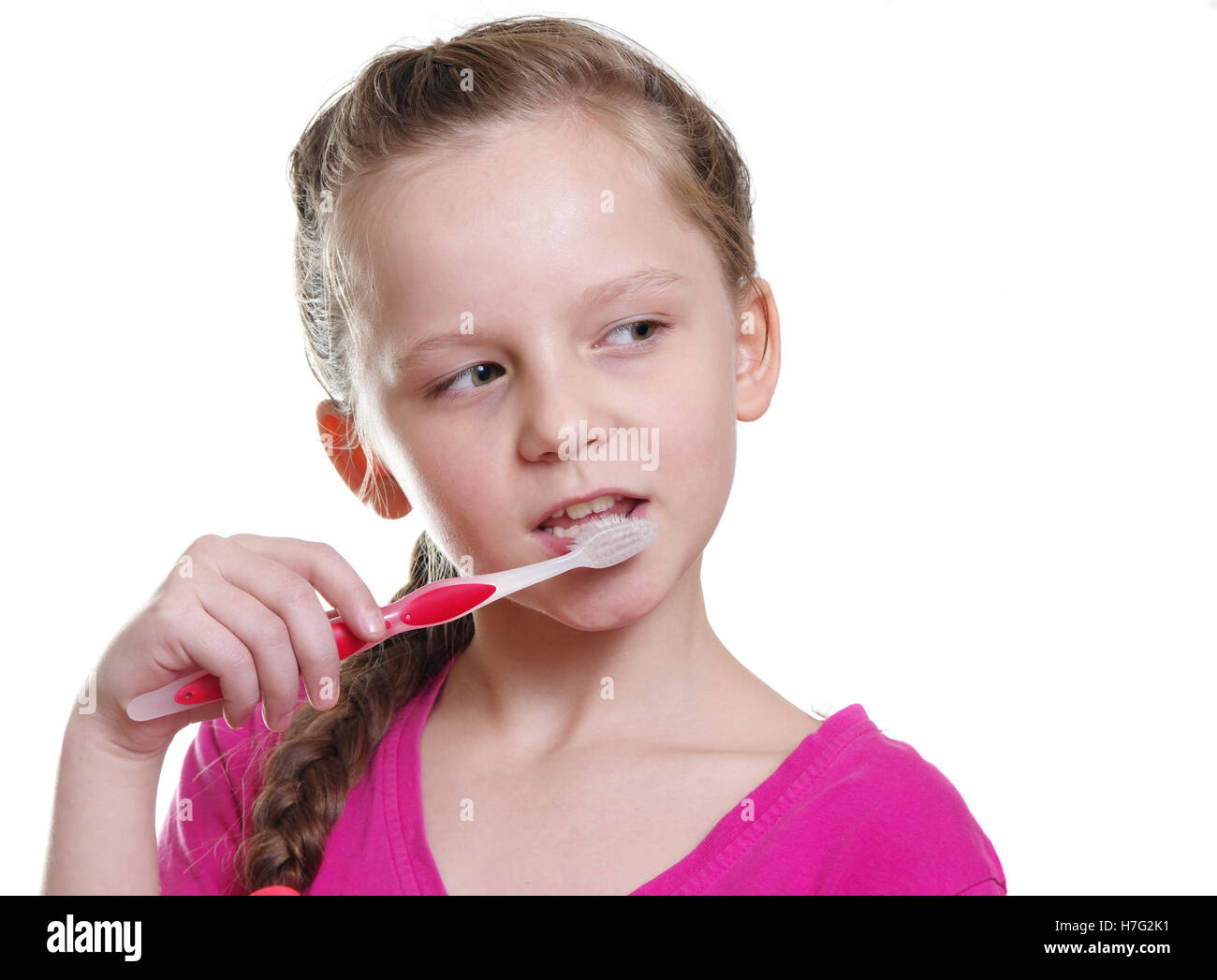 little girl with toothbrush on white Stock Photo - Alamy