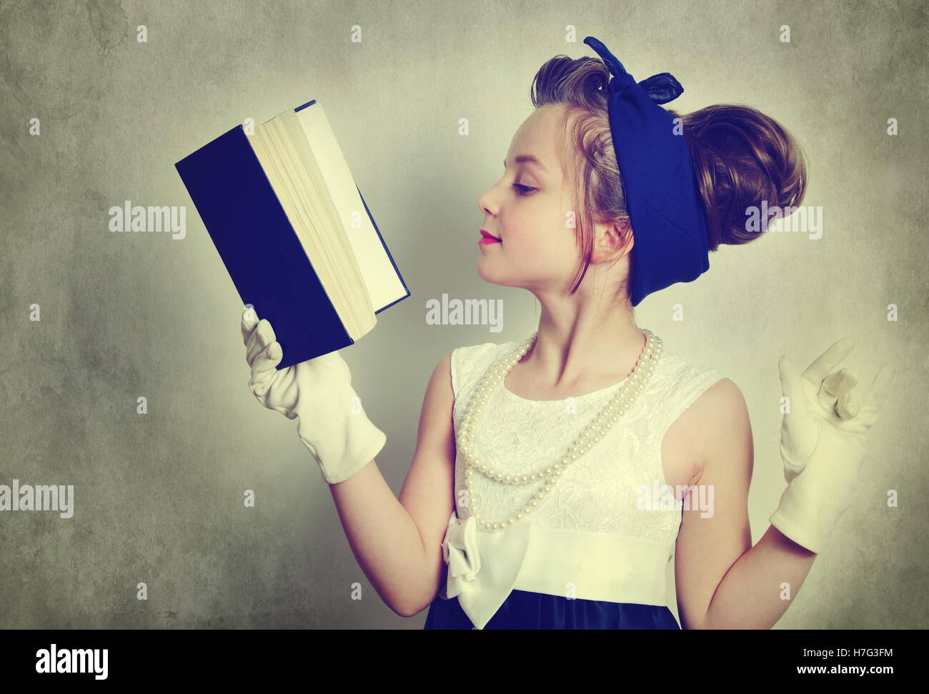 pretty girl with book portrait,retro style Stock Photo - Alamy