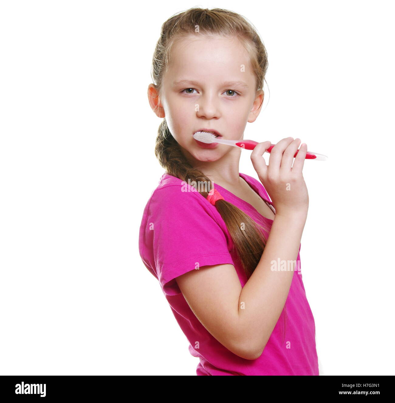 little girl with toothbrush on white Stock Photo - Alamy