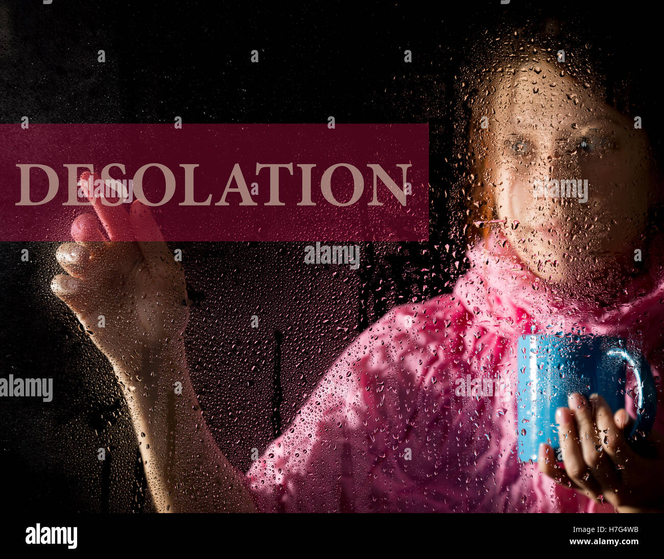 desolation written on virtual screen. young woman melancholy and sad at ...