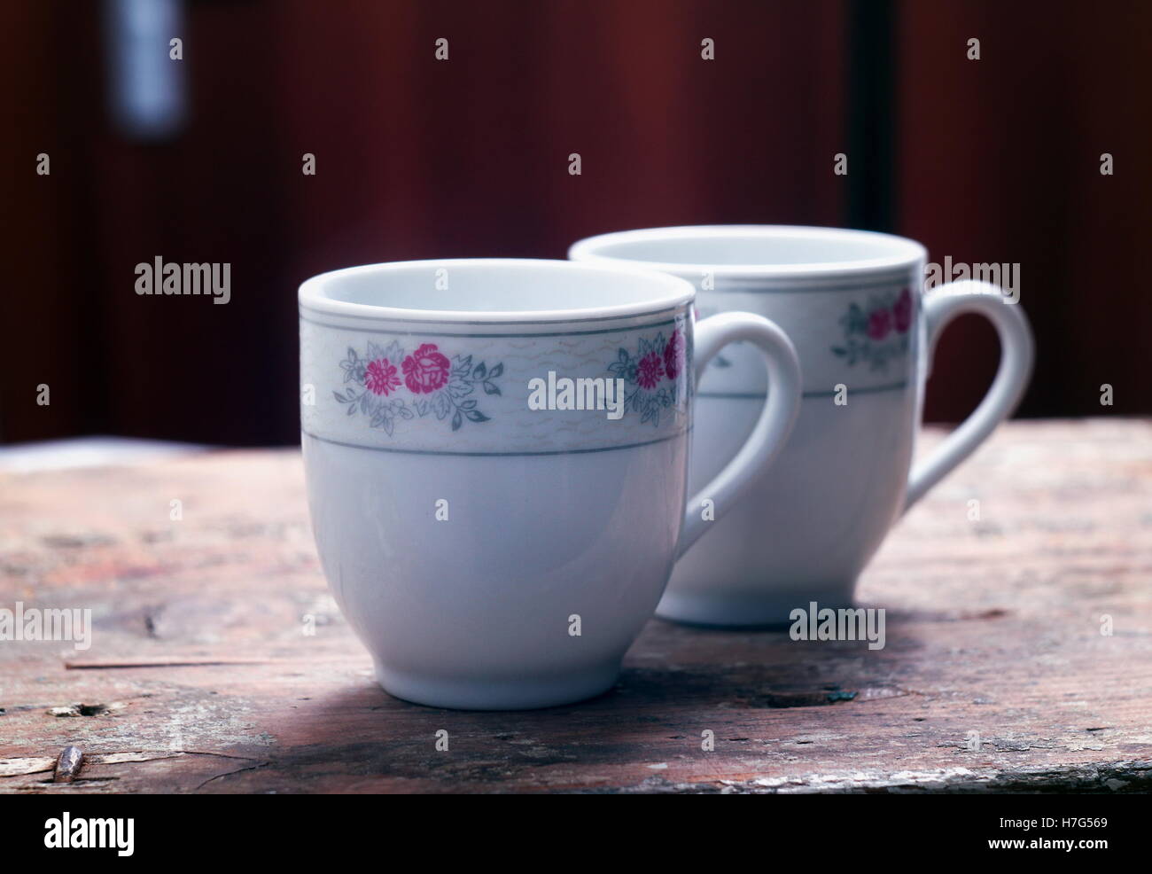 two coffee mugs on table Stock Photo - Alamy