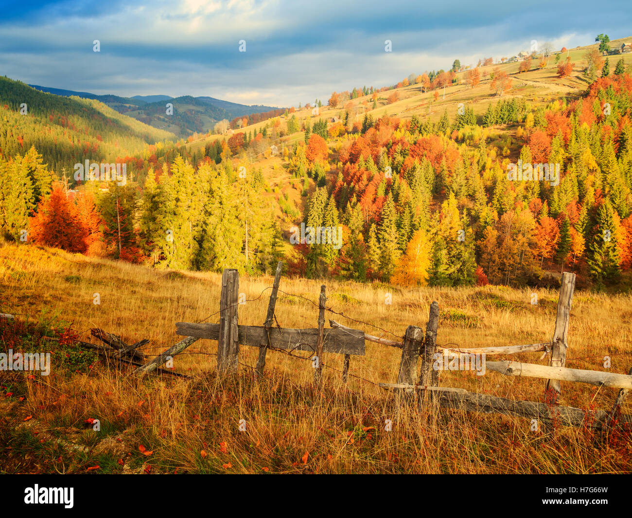 Colorful autumn landscape scene with fence in Transylvania mountain ...