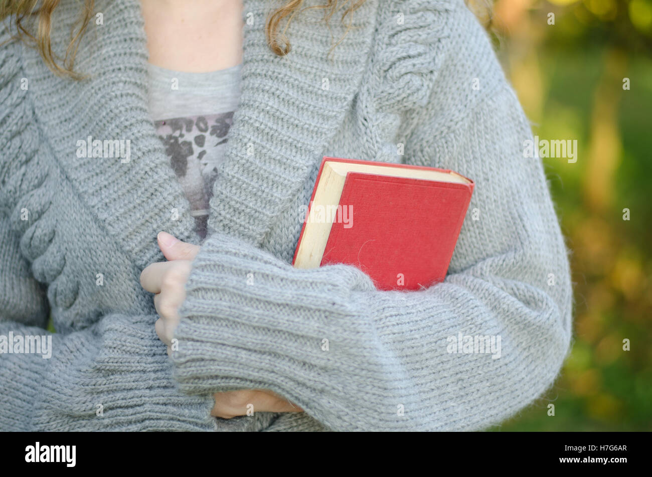 Woman in red sweater on hi-res stock photography and images - Alamy