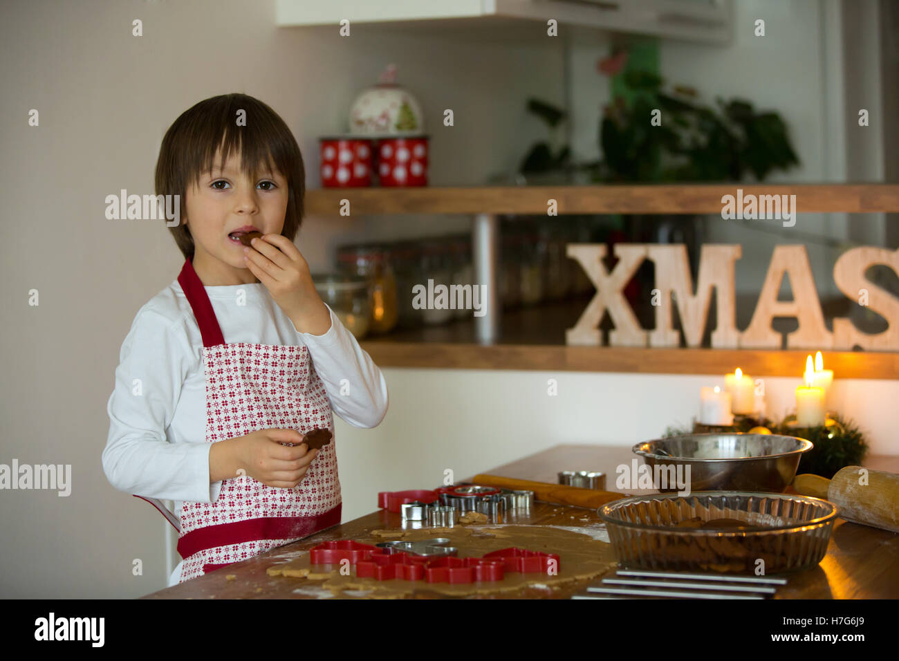 Two sweet children, boy brothers, preparing gingerbread cookies for ...