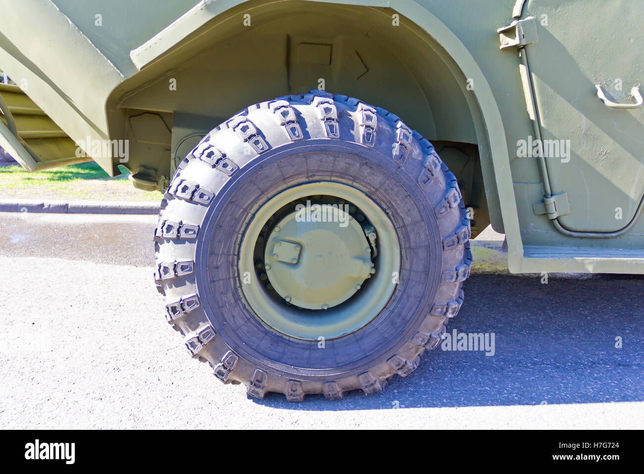 Wheel of military machine at the exhibition under open sky Stock Photo ...