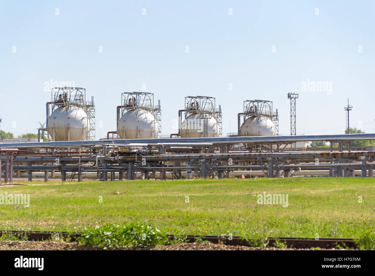 A complex oil refinery reservoirs for keeping Stock Photo - Alamy