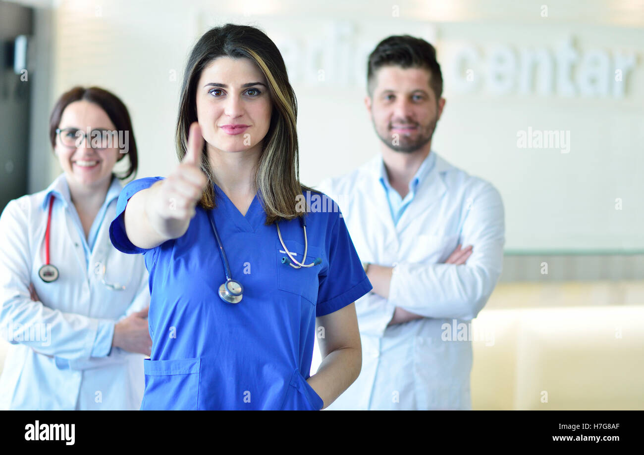 Female doctor leading a medical team at the hospital Stock Photo - Alamy