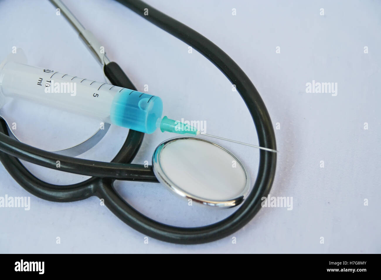Medical tools. Medical syringe. Syringe and a cure Stock Photo - Alamy
