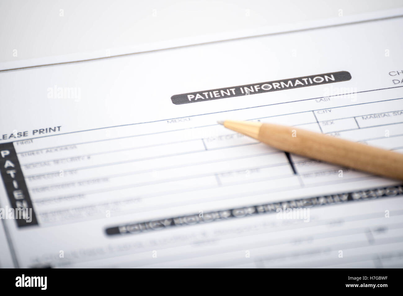 Patient information form and pen on desk,Medical questionnaire Stock ...