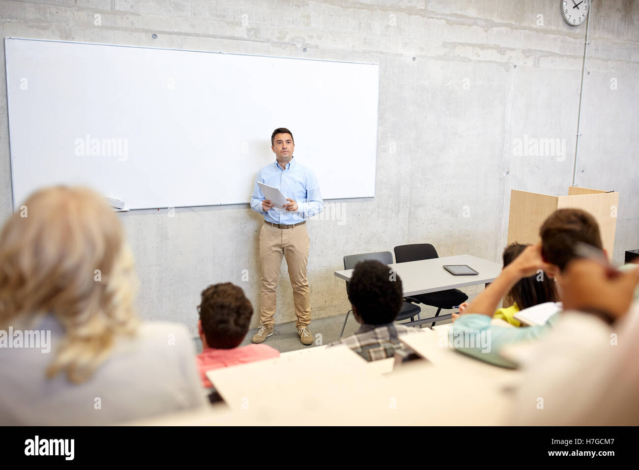 group of students and teacher at lecture Stock Photo - Alamy