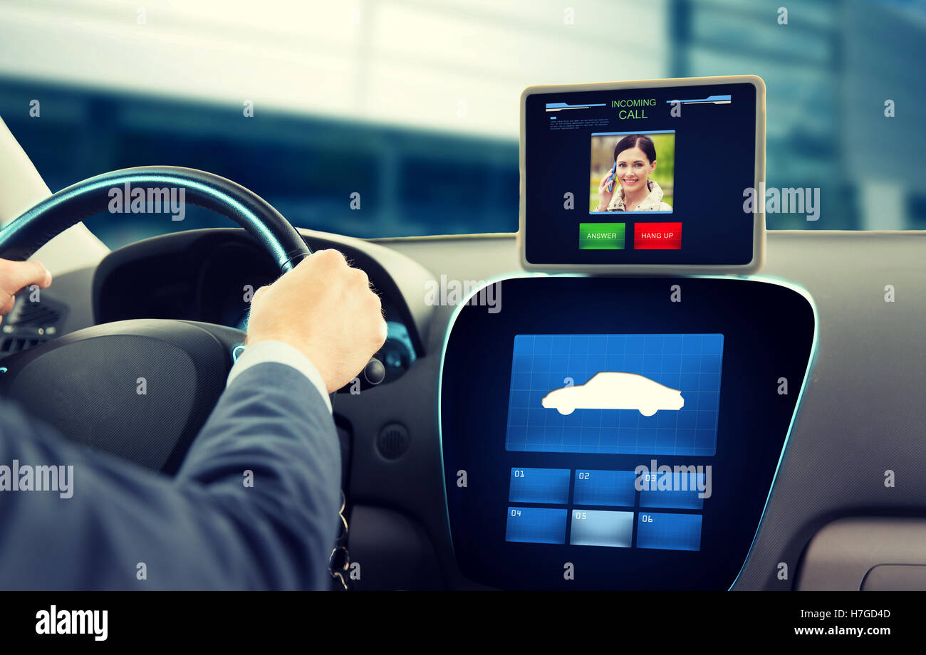 close up of man driving car and receiving call Stock Photo - Alamy